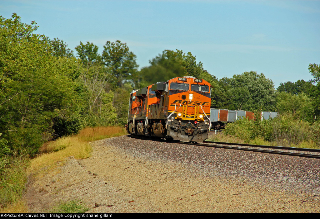 BNSF 6917 Rips a hot Z train around a long sweeping curve.